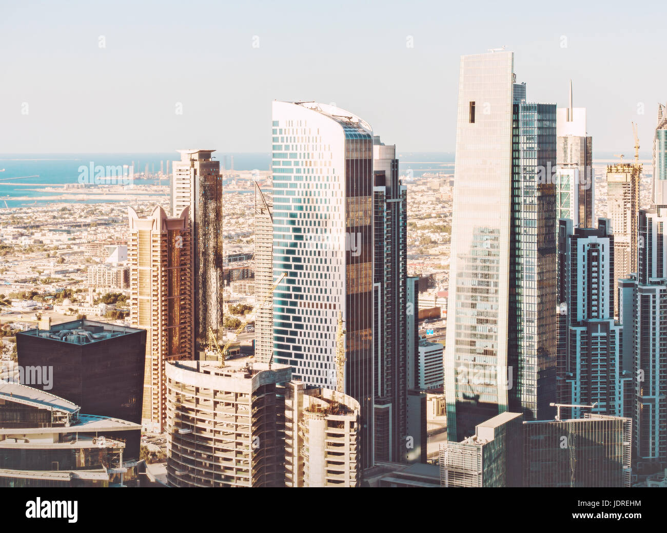 Beautiful architectural background. Close-up view of Dubai towers at ...
