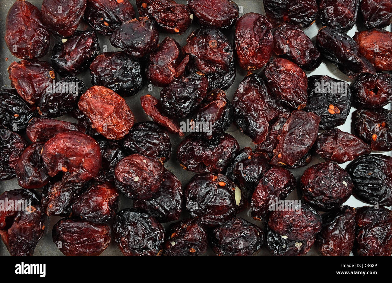 Dried cranberries background Stock Photo - Alamy