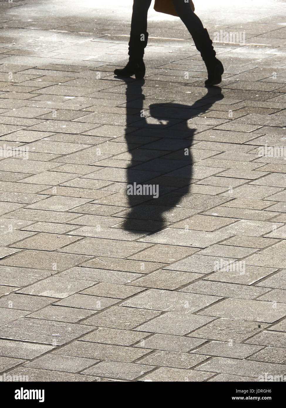 shadows of people walking on pavement Stock Photo - Alamy