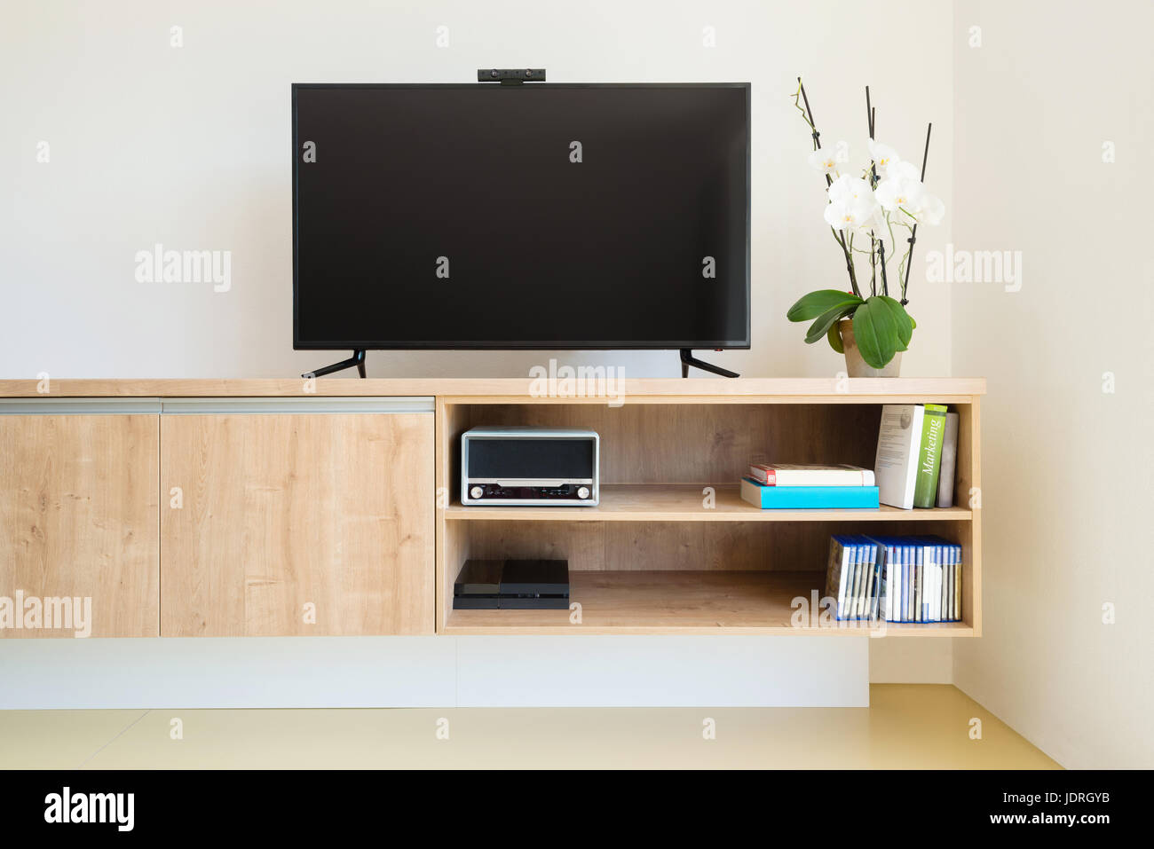 TV screen in contemporary living room Stock Photo - Alamy