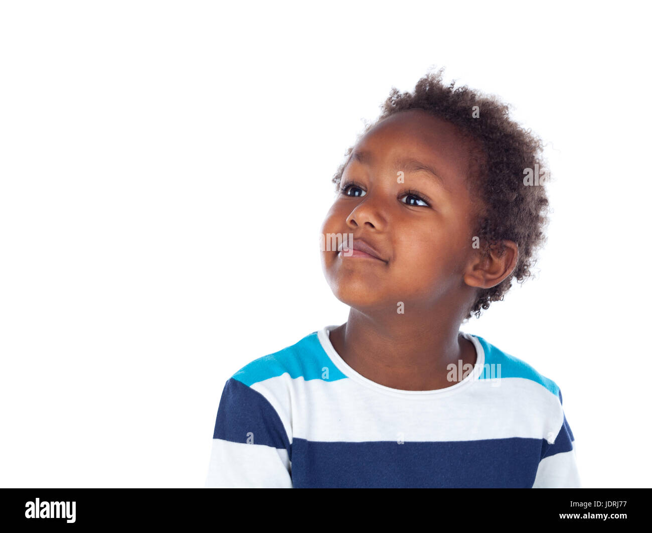 Adorable afroamerican child looking up isolated on a white background ...
