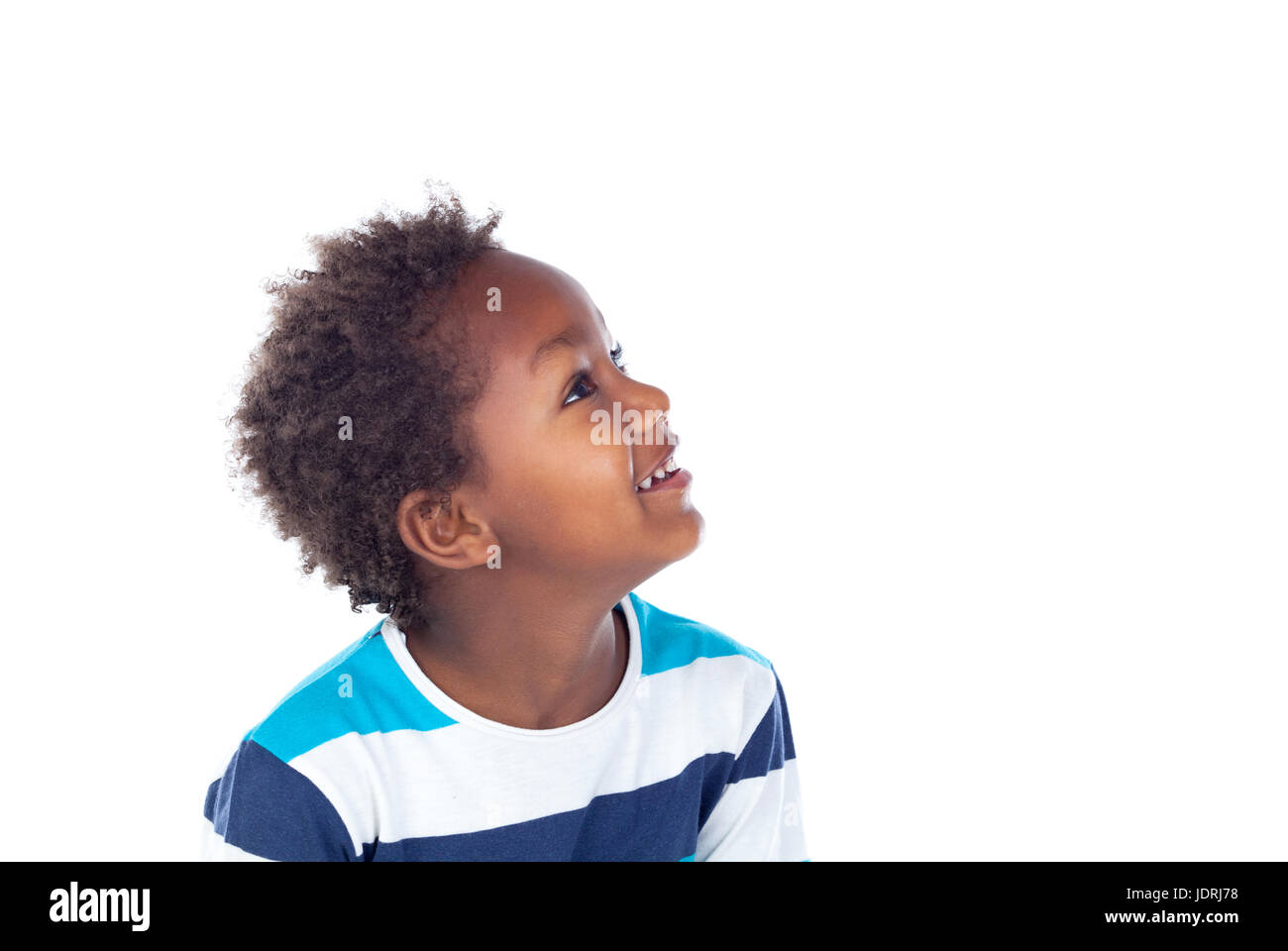 Adorable afroamerican child looking up isolated on a white background ...