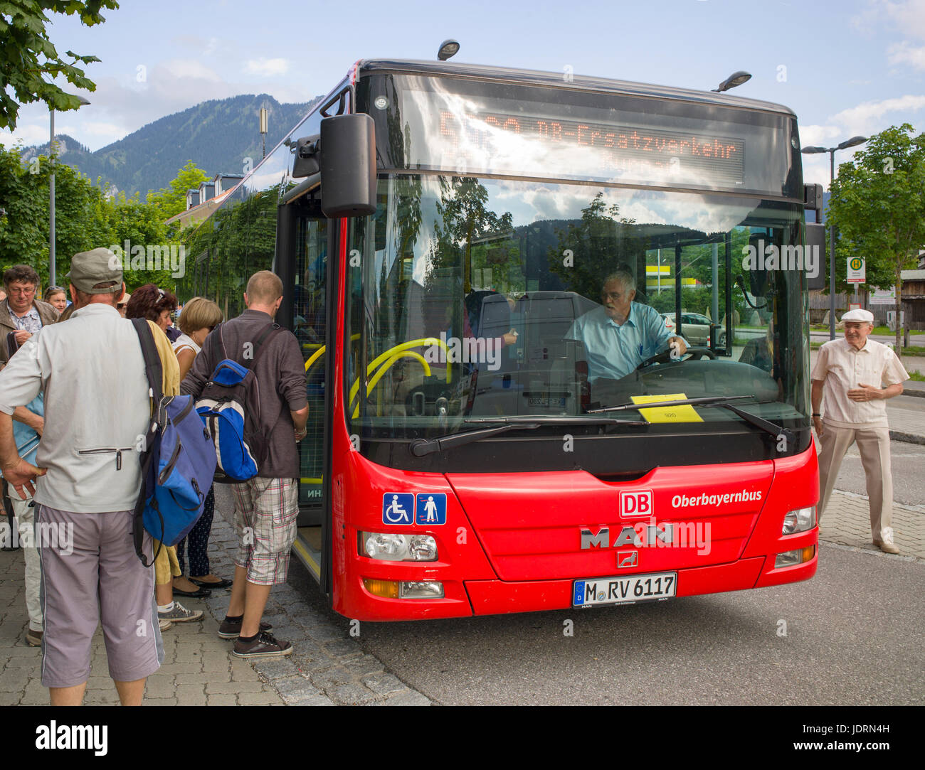 Passengers boarding bus operated by Deutsche Bahn replacing train ...