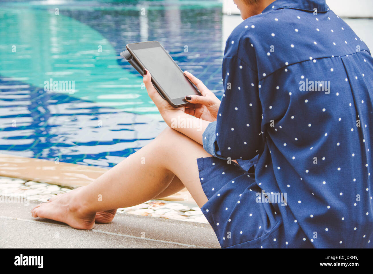 woman touch screen on smartphone with nature background. subject is ...