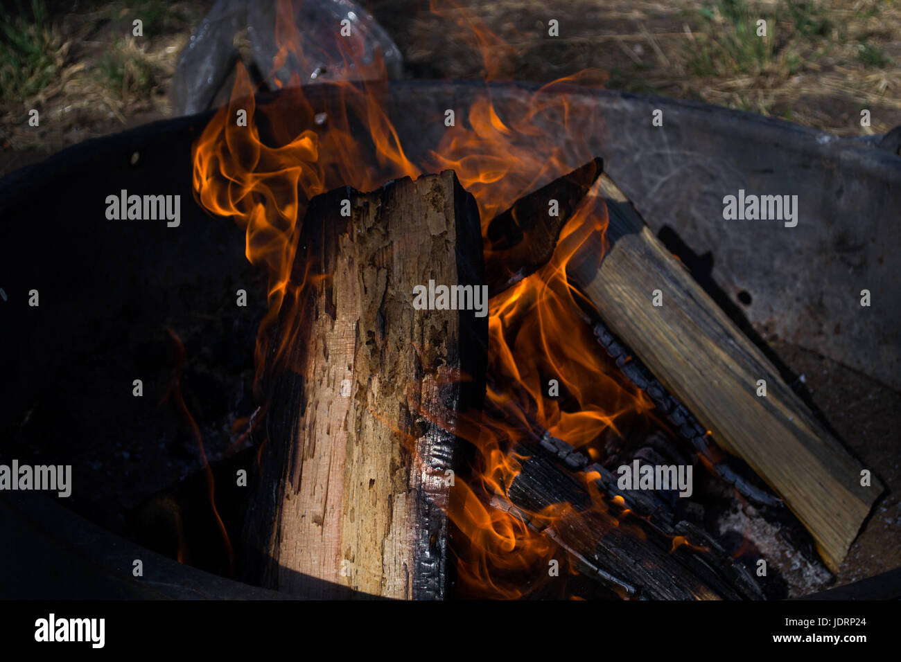 Sitting by the fire Stock Photo - Alamy
