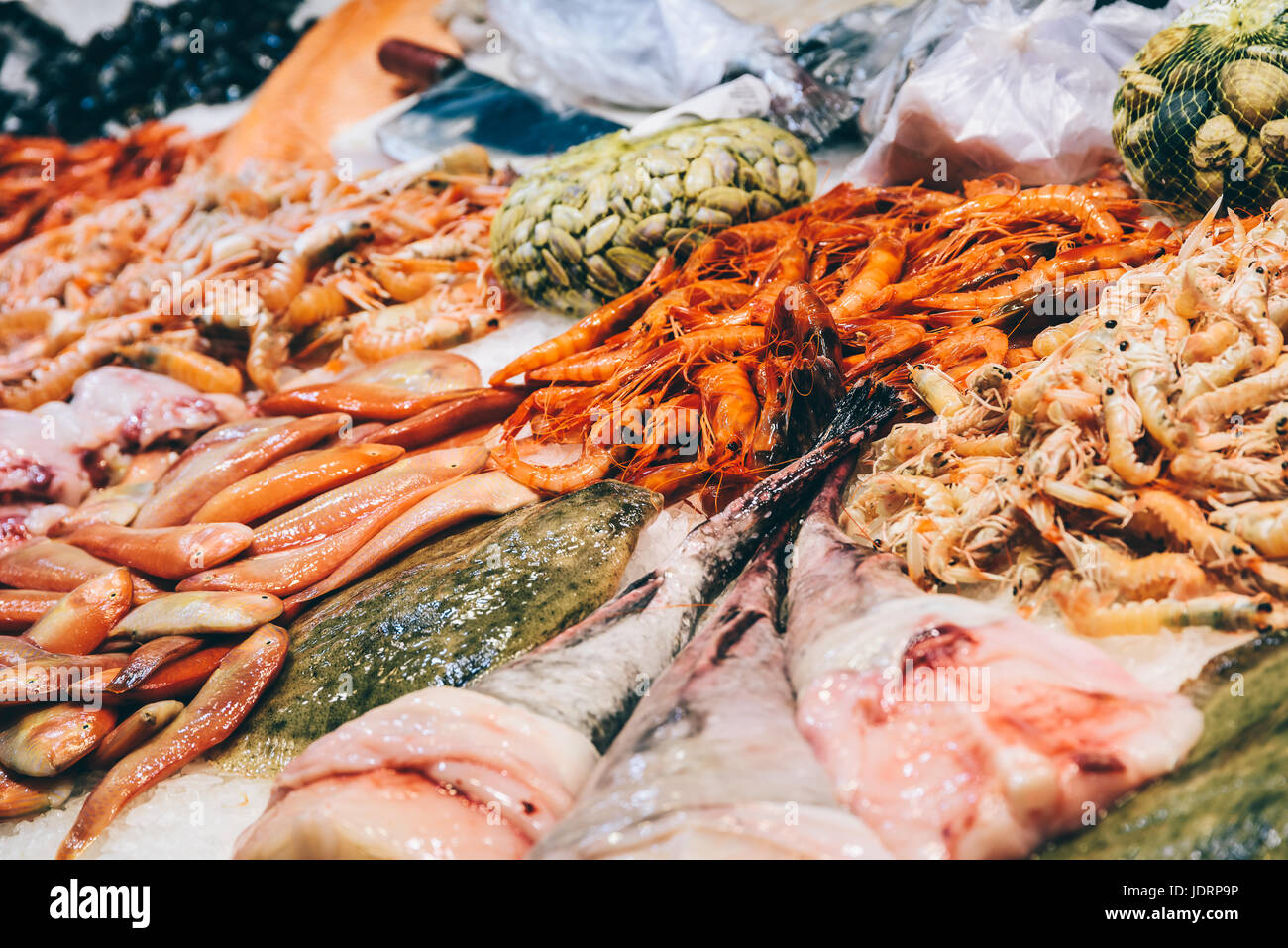 Fresh Fishes And Seafood On Ice In Fish Market Stock Photo - Alamy
