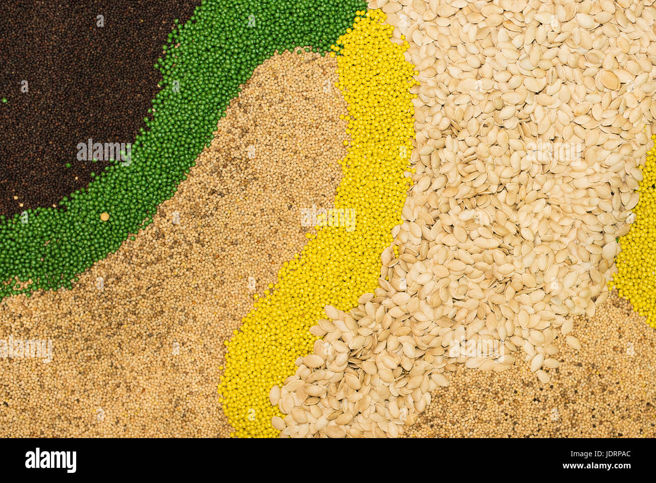 Variety of agricultural crop seed as background, multicolored natural ...