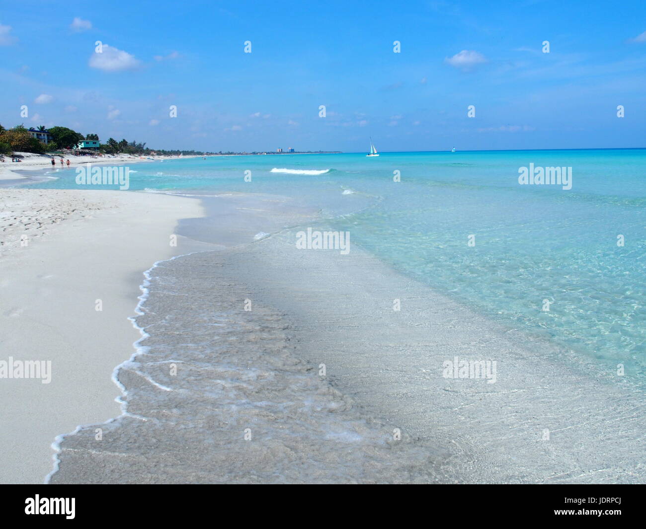 Sandy beach at Caribbean Sea in VARADERO city in CUBA with clear water ...
