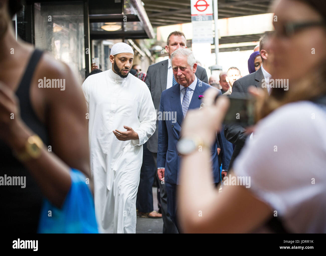 The Prince of Wales visits tributes left at the scene of the Finsbury ...