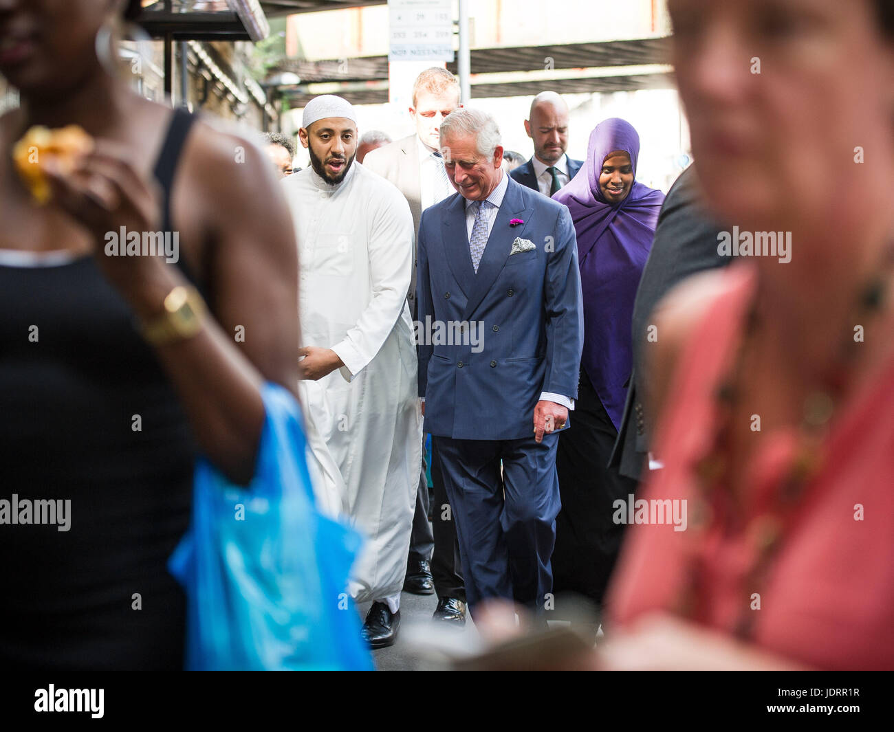 The Prince of Wales visits tributes left at the scene of the Finsbury ...
