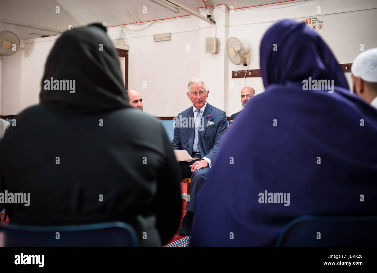 The Prince of Wales speaks to members during a visit to Muslim Welfare ...
