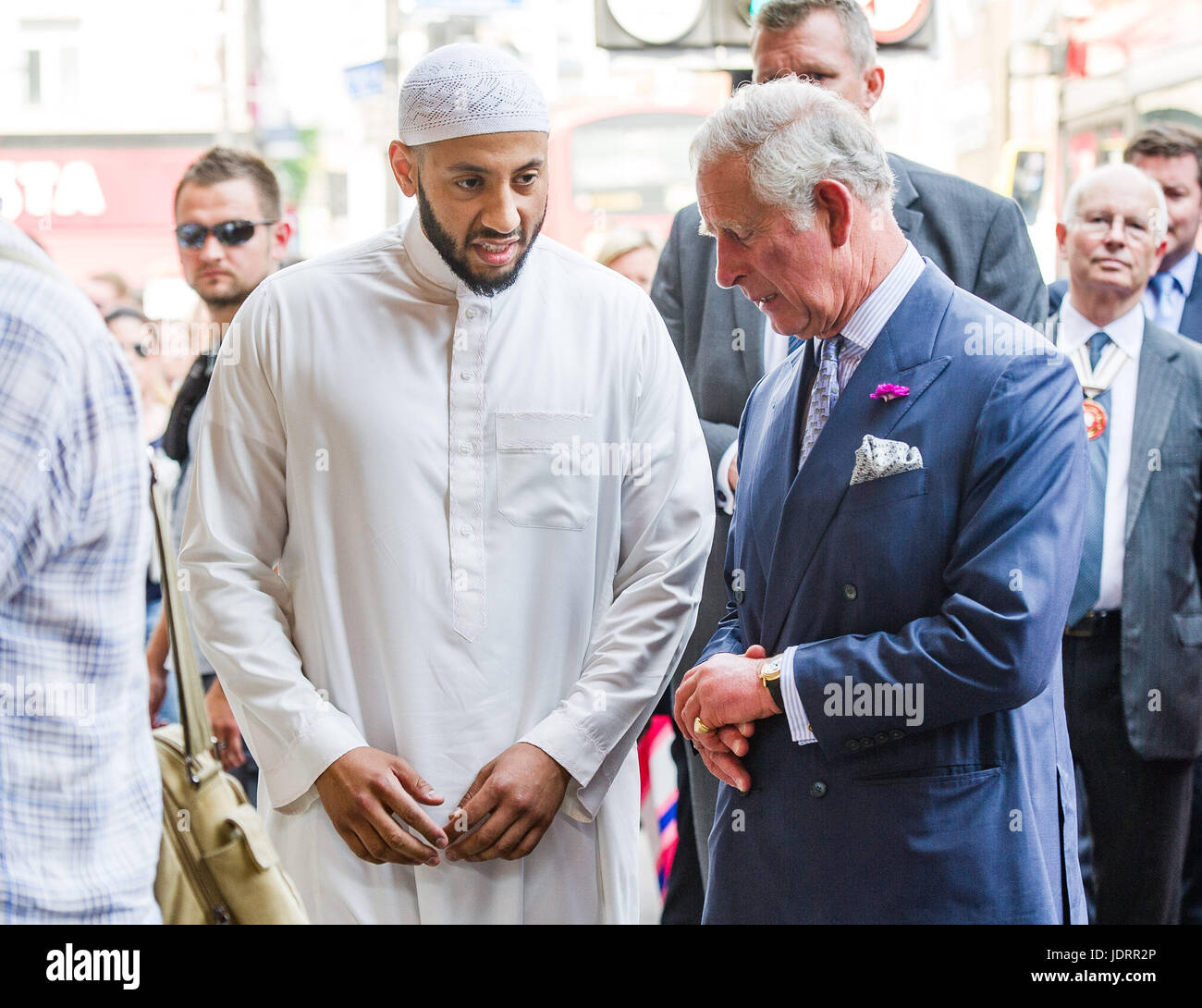 The Prince of Wales visits tributes left at the scene of the Finsbury ...