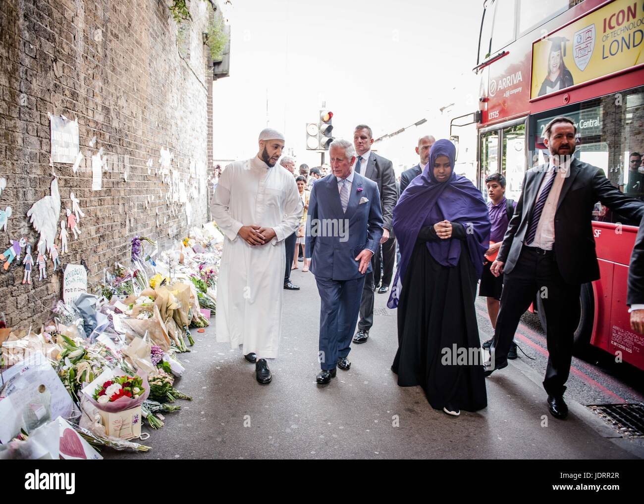 The Prince of Wales visits tributes left at the scene of the Finsbury ...