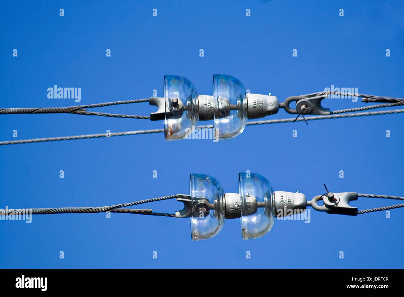 Railroad overhead lines against clear blue sky, Contact wire Stock ...