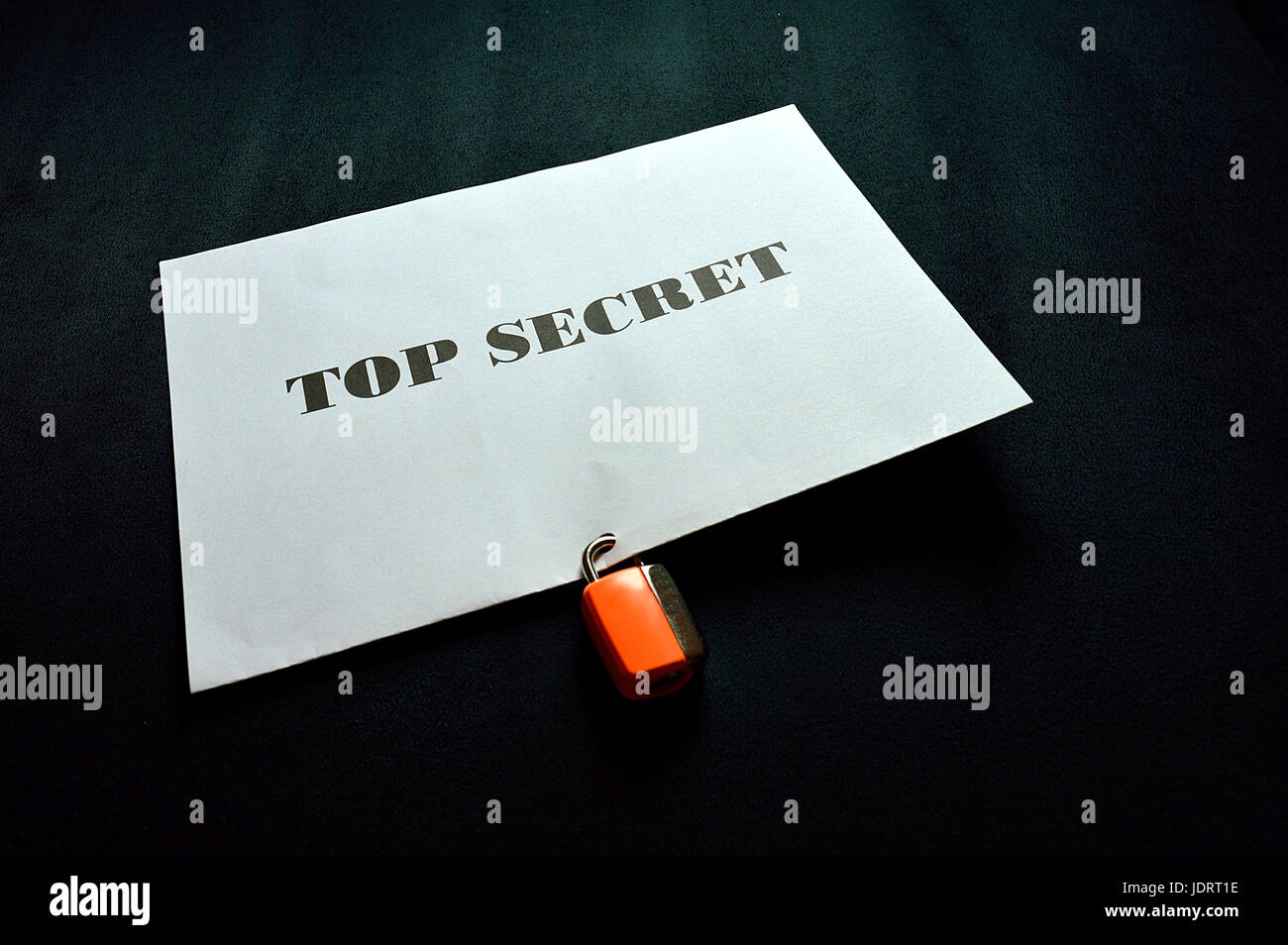 Top Secret Paper locked with a lock Stock Photo - Alamy