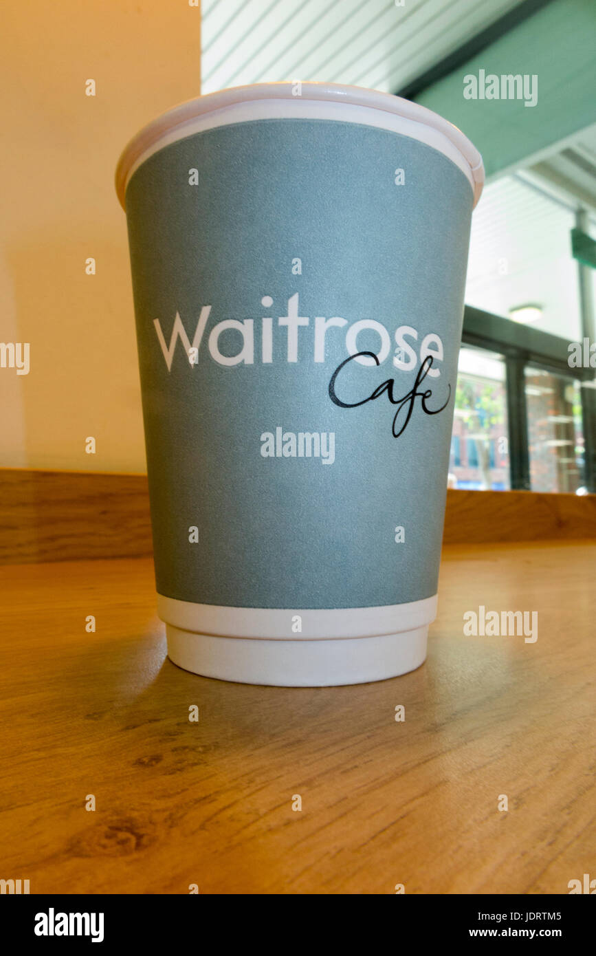 A cup of free coffee at a Waitrose supermarket. UK. This cup is a ...