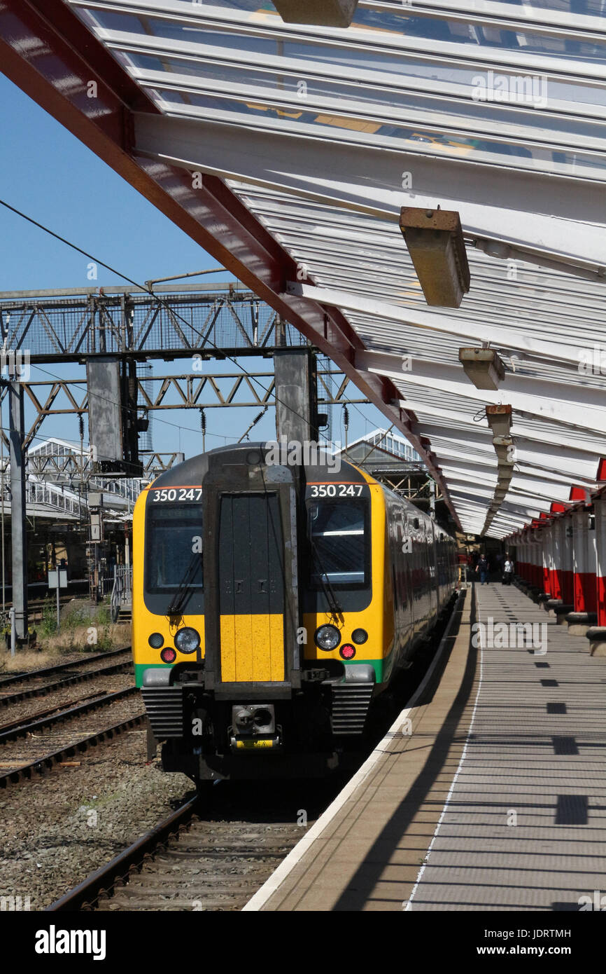 London Midland liveried class 350 Desiro electric multiple unit waits ...