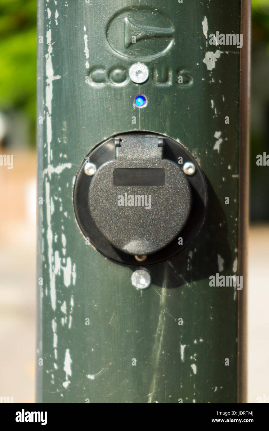An electric car charger conversion by Ubitricity: smart cable on a ...