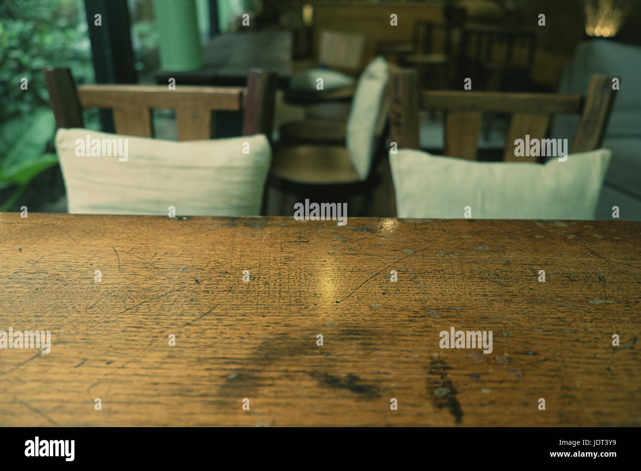 Top of empty wood table with Bar Cafe Restaurant blurred background ...