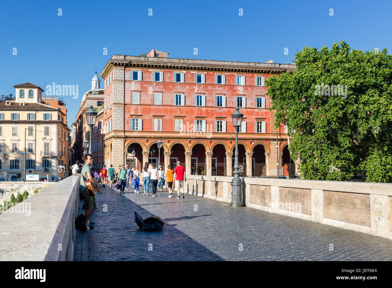 People walking on Ponte Sisto to go in Piazza Trilussa, Trastevere ...
