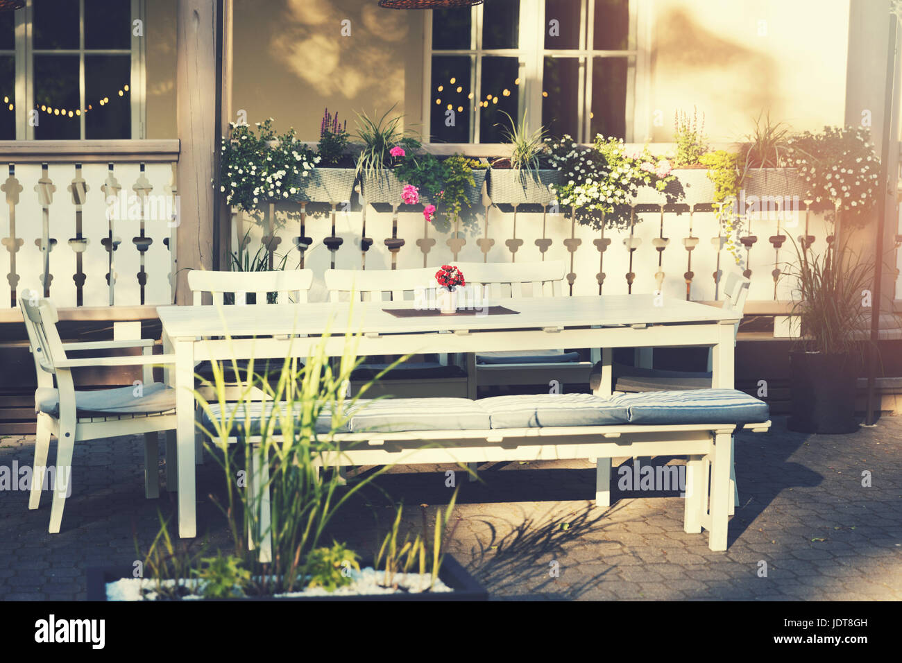 cafe with outdoor terrace at sunset Stock Photo - Alamy