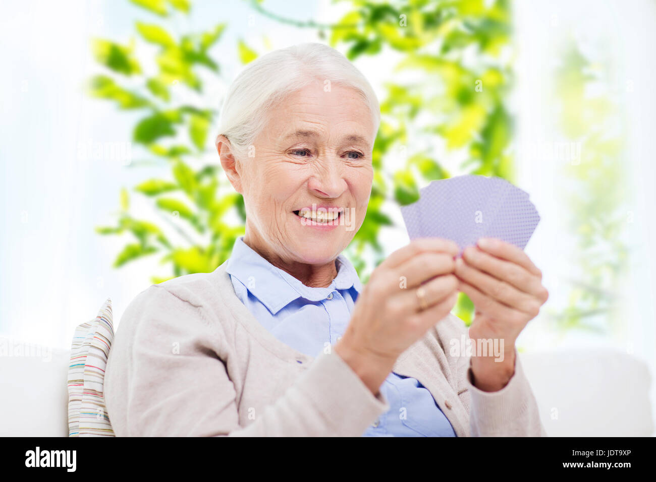 Happy Senior Woman Playing Cards At Home Stock Photo Alamy happy-senior-woman-playing-cards-at-home-stock-photo-alamy