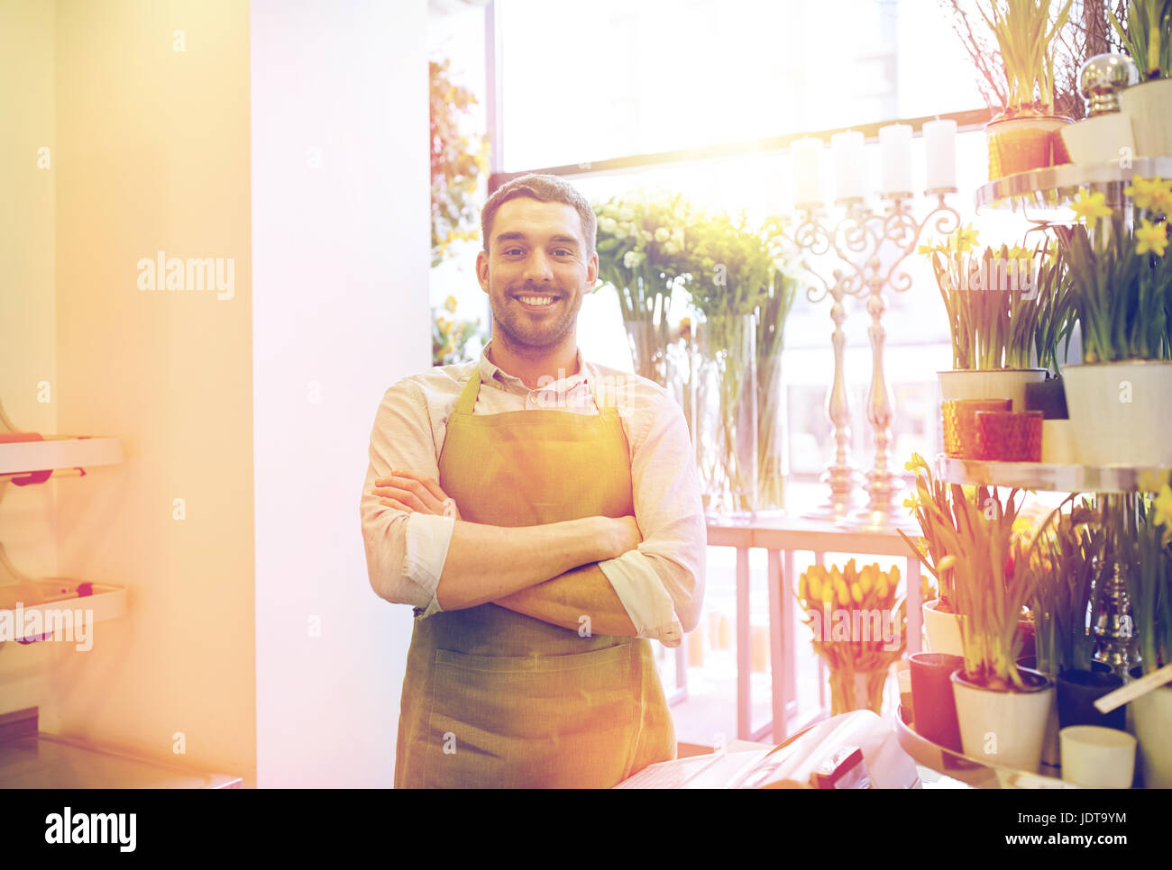 florist man or seller at flower shop counter Stock Photo - Alamy