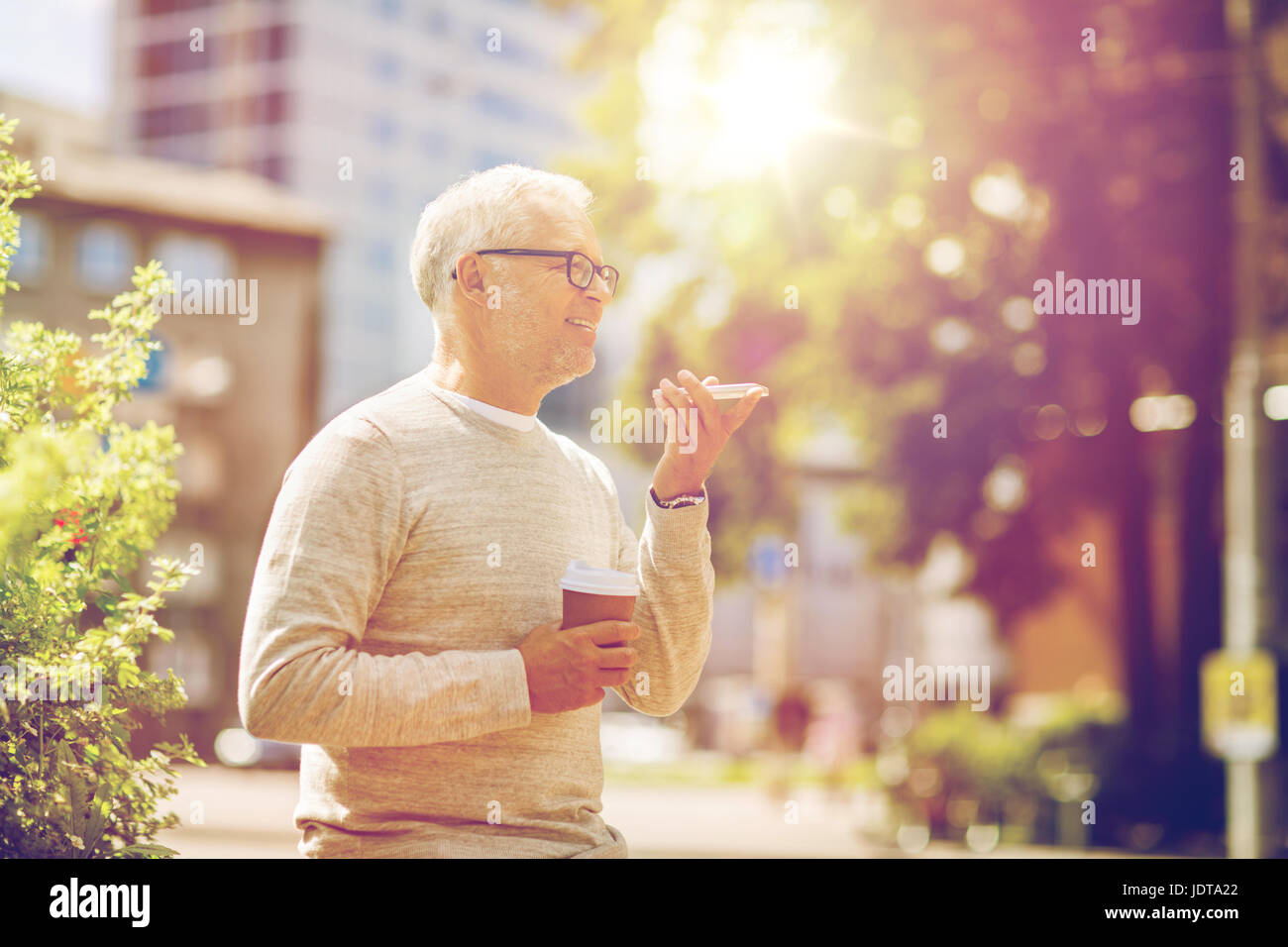 Happy man using voice hi-res stock photography and images - Alamy