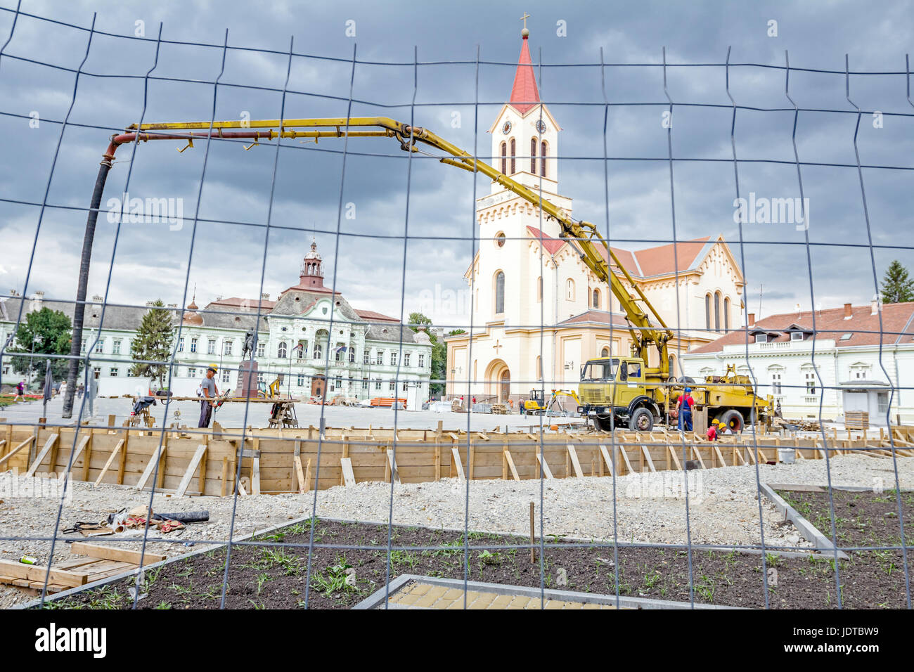 View on the pump crane for lifting and casting concrete at construction ...