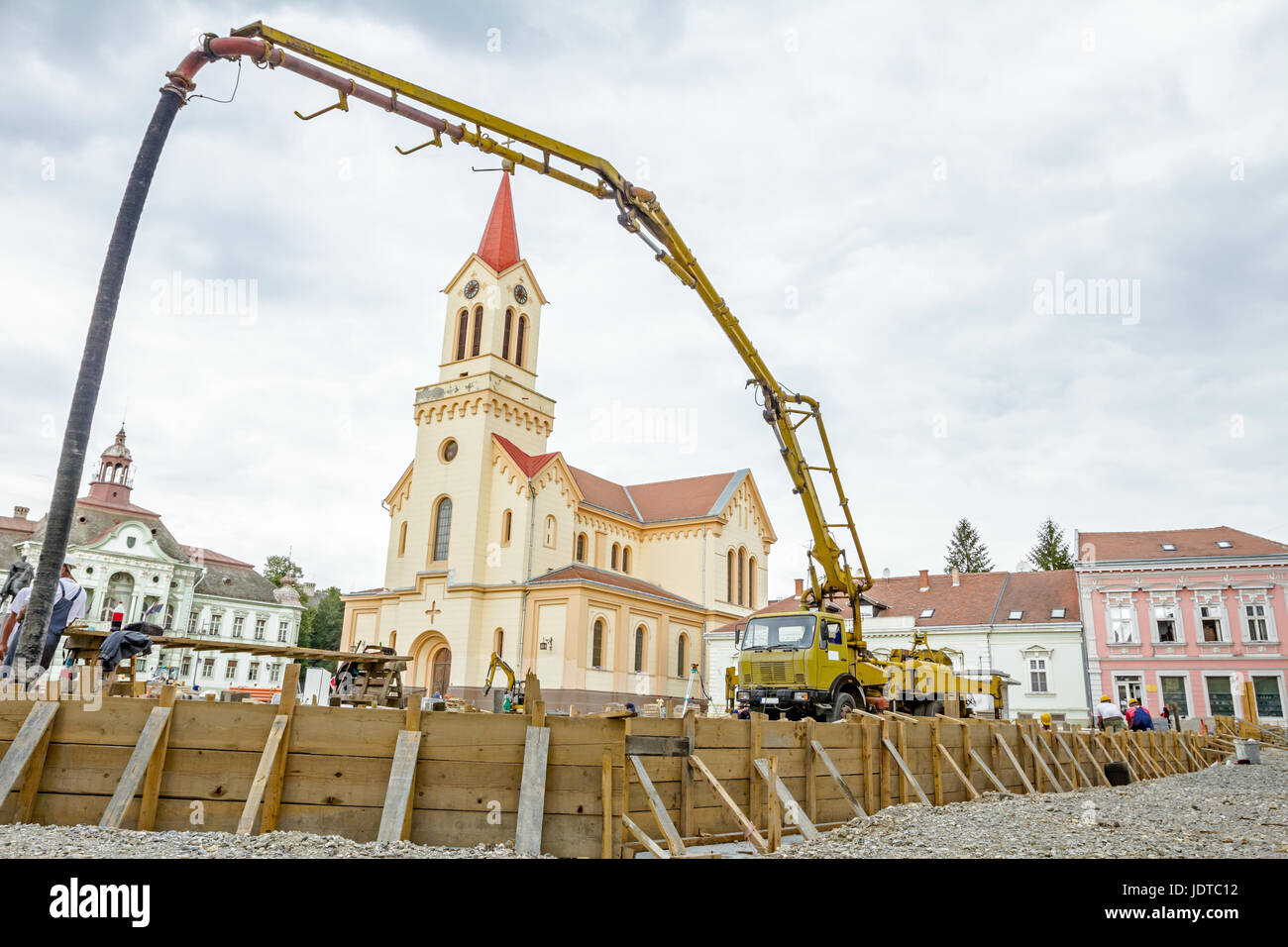 Prepared crane's arm of mechanical pump is ready for concrete transport ...