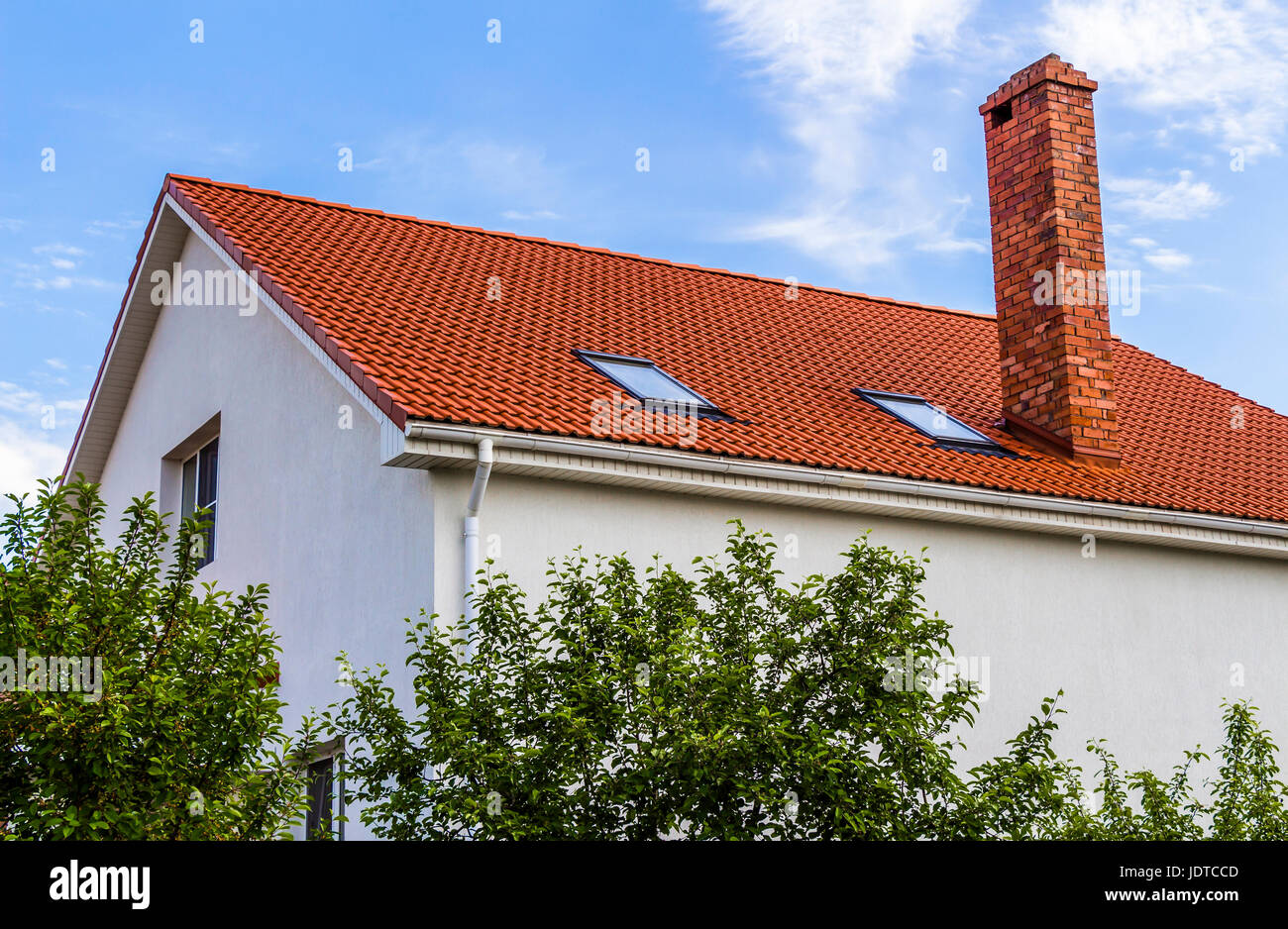 The upper part of the house. Roof, inspection windows, chimney Stock ...