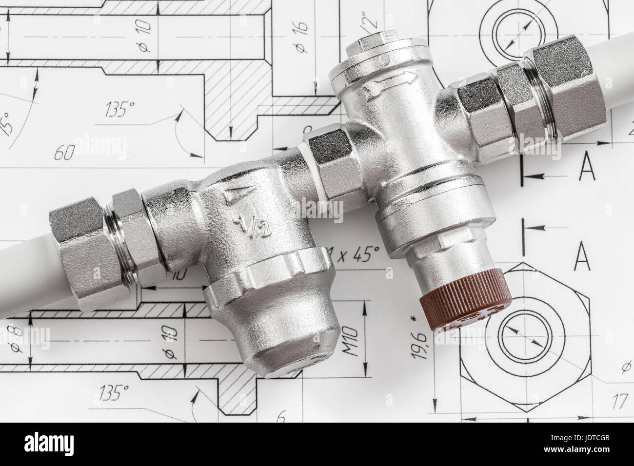 Equipment for plumbing close-up on the background of drawings Stock ...
