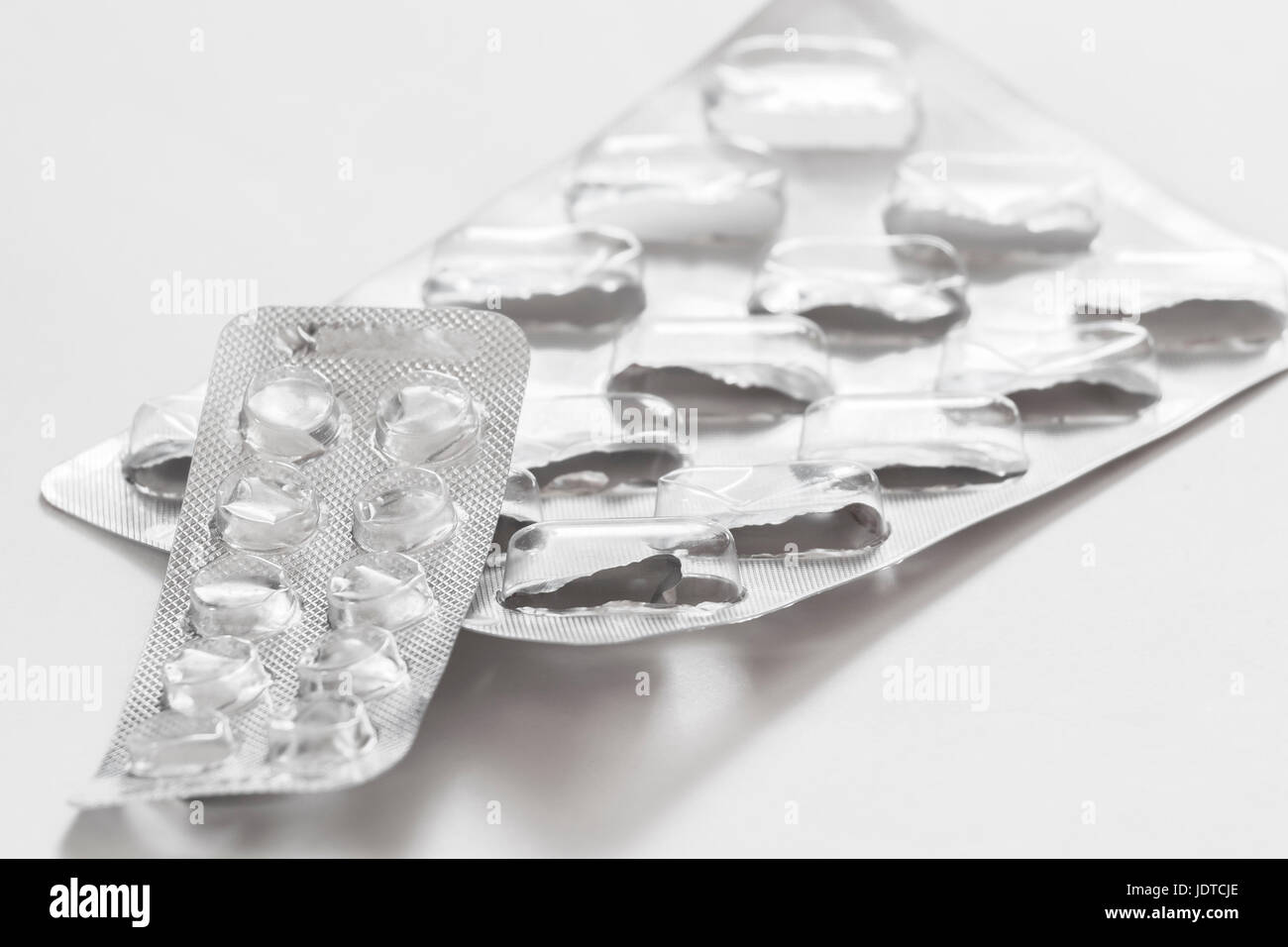 Empty packaging of pills close-up on a light background Stock Photo - Alamy