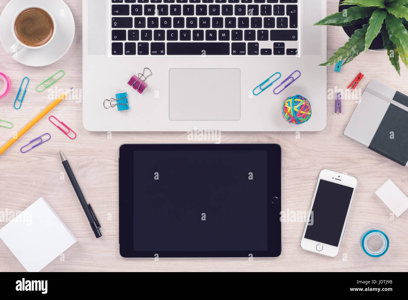 Office desk table workplace with laptop keyboard tablet pc and ...