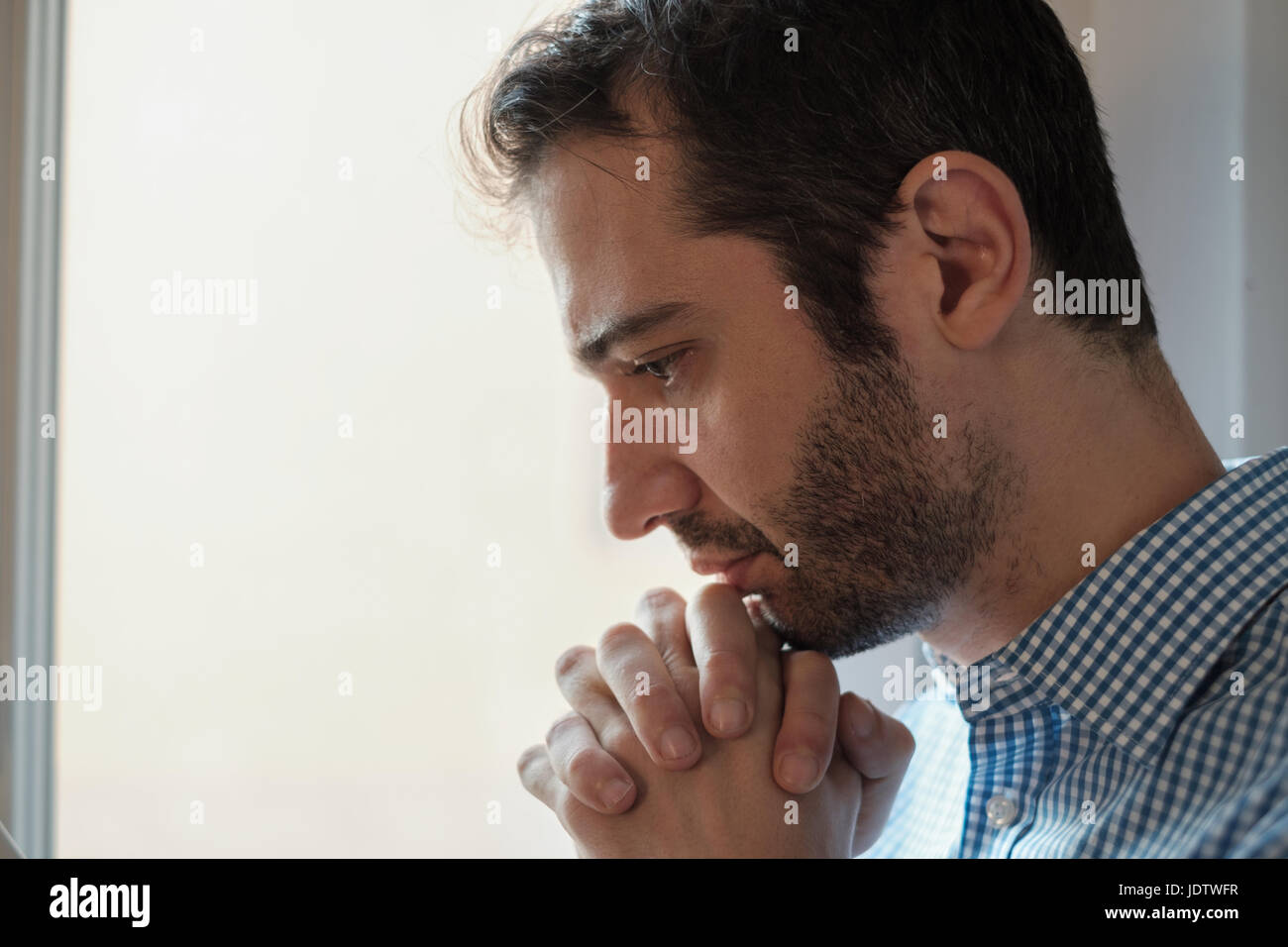 Sad priest hi-res stock photography and images - Alamy