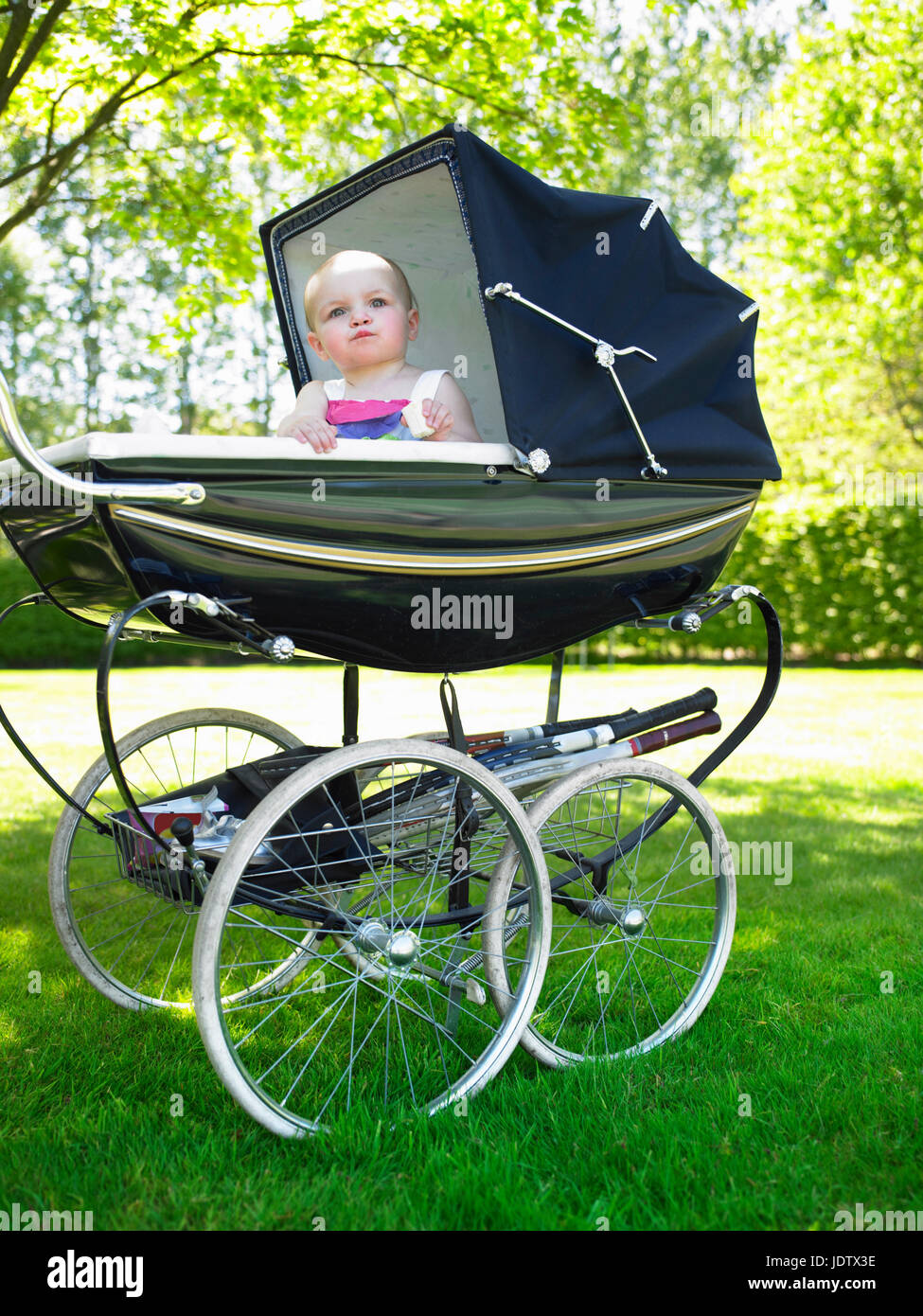 Baby in pram Stock Photo - Alamy