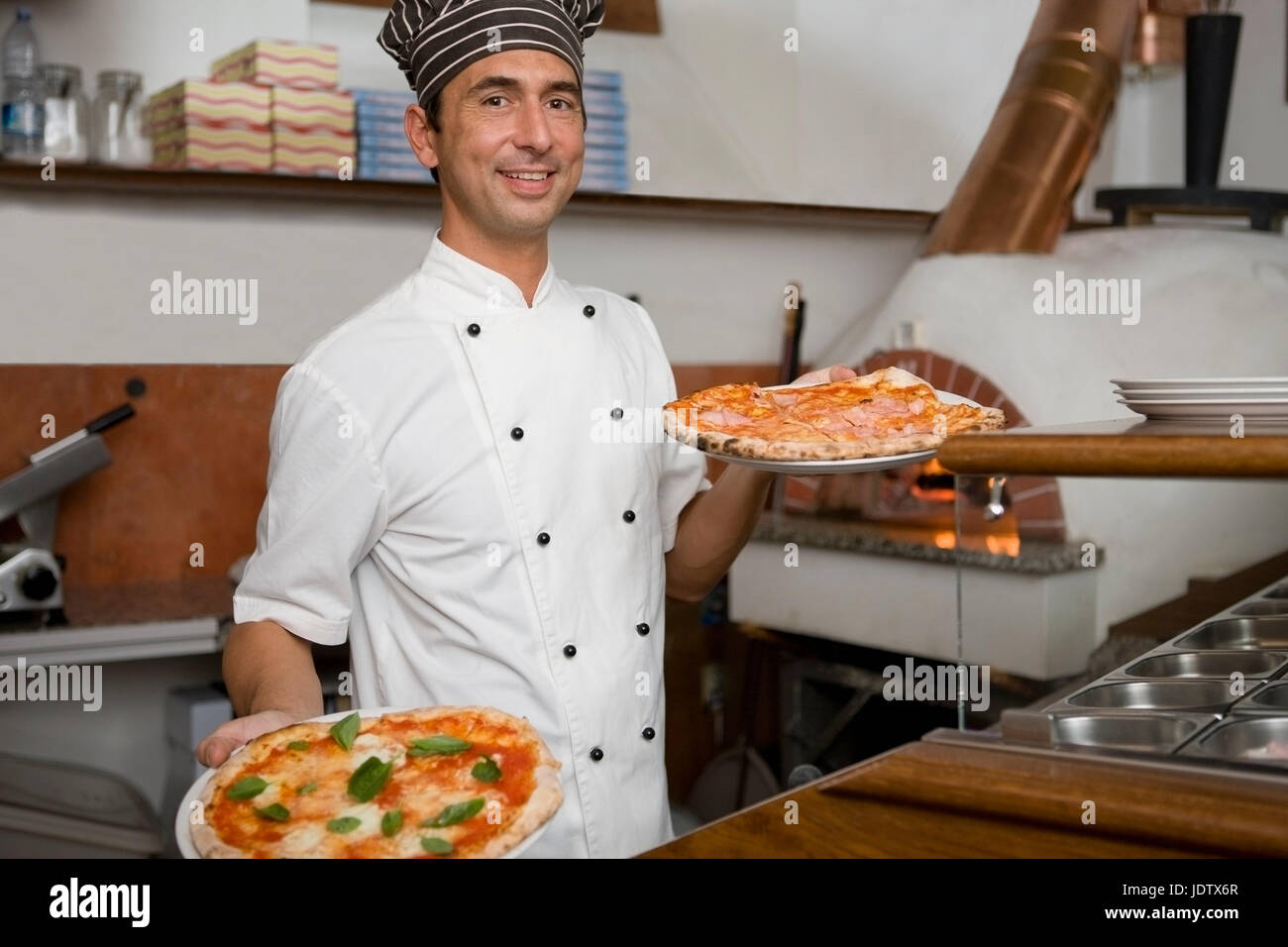 People in a pizzaria Stock Photo - Alamy