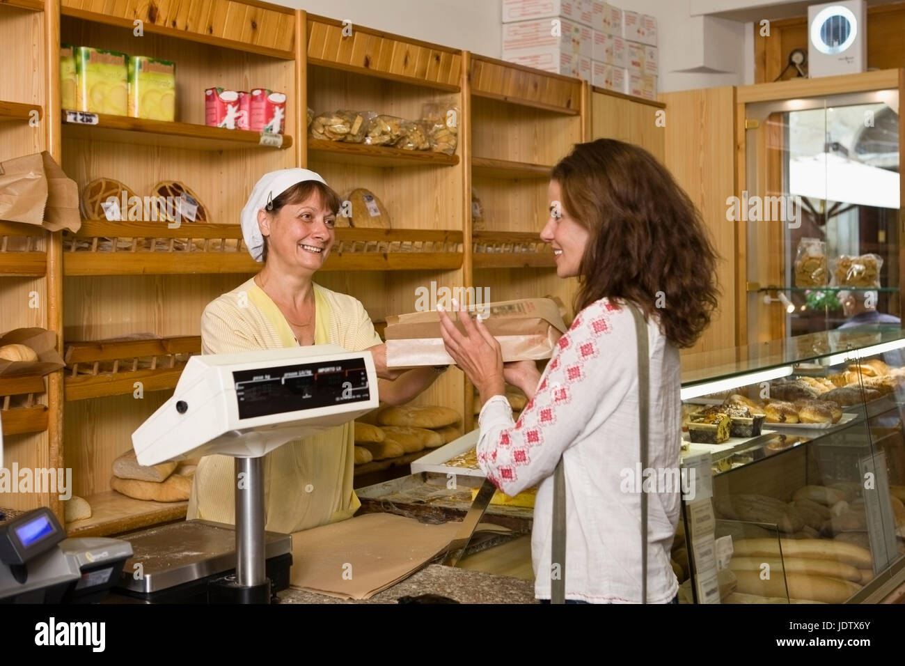 People in a bakery Stock Photo - Alamy