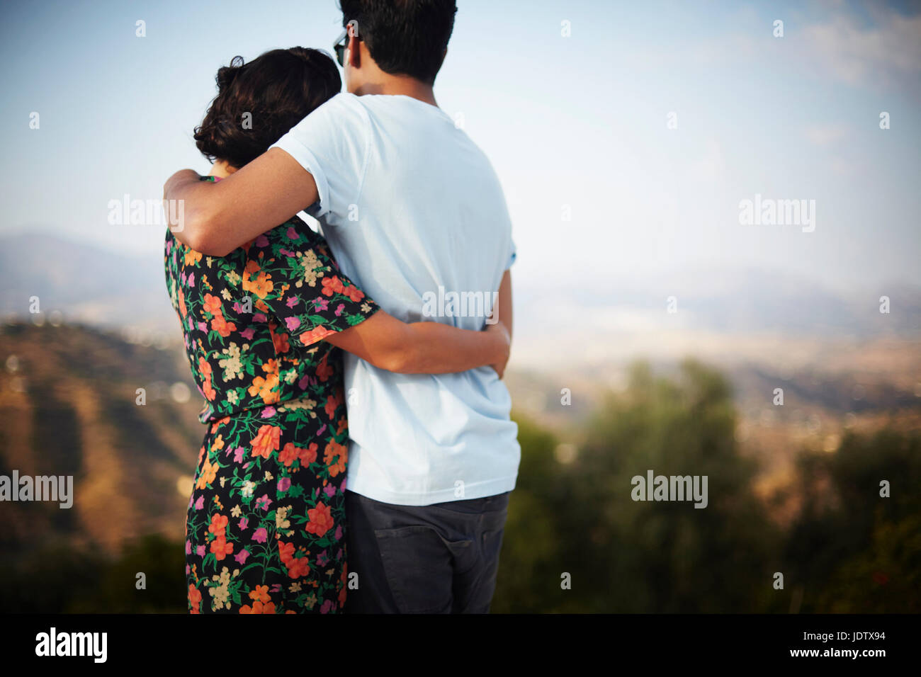 Couple looking at a view Stock Photo - Alamy