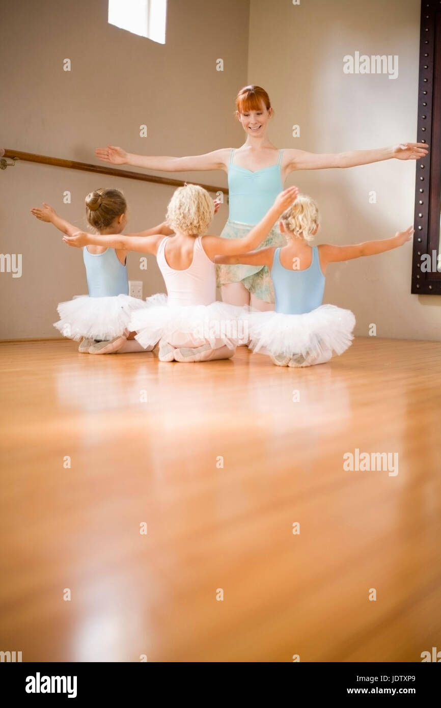 Girls posing in ballet class Stock Photo - Alamy