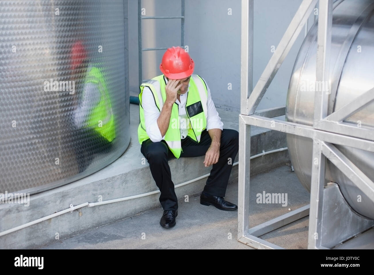 Exhausted work resting at factory Stock Photo - Alamy