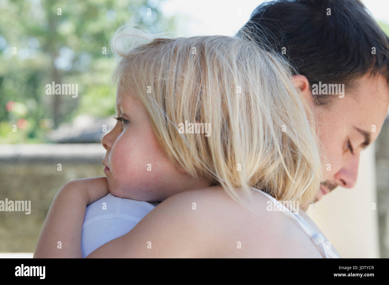 Close up of father hugging child Stock Photo - Alamy