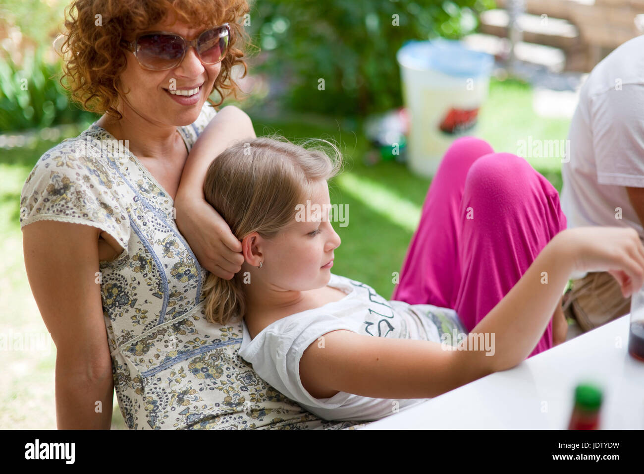 Girl resting head on table hi-res stock photography and images - Alamy