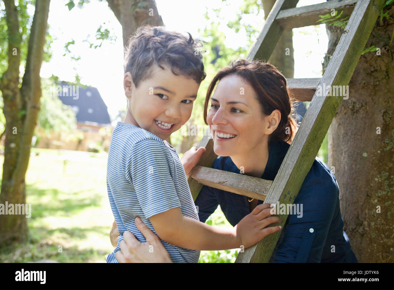 Mother and son playing with ladder Stock Photo - Alamy