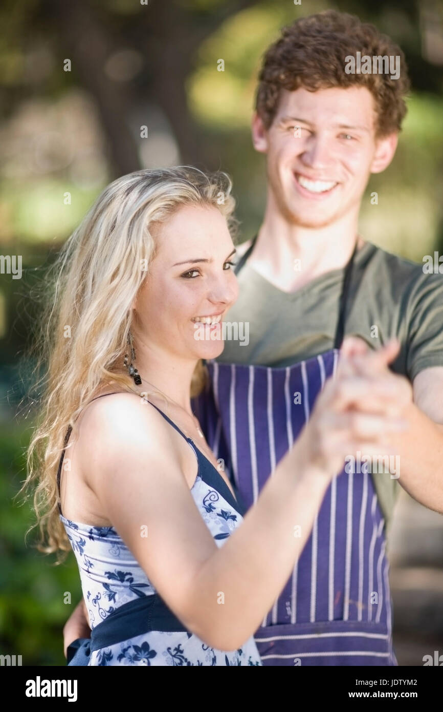 Couple dancing together outdoors Stock Photo - Alamy