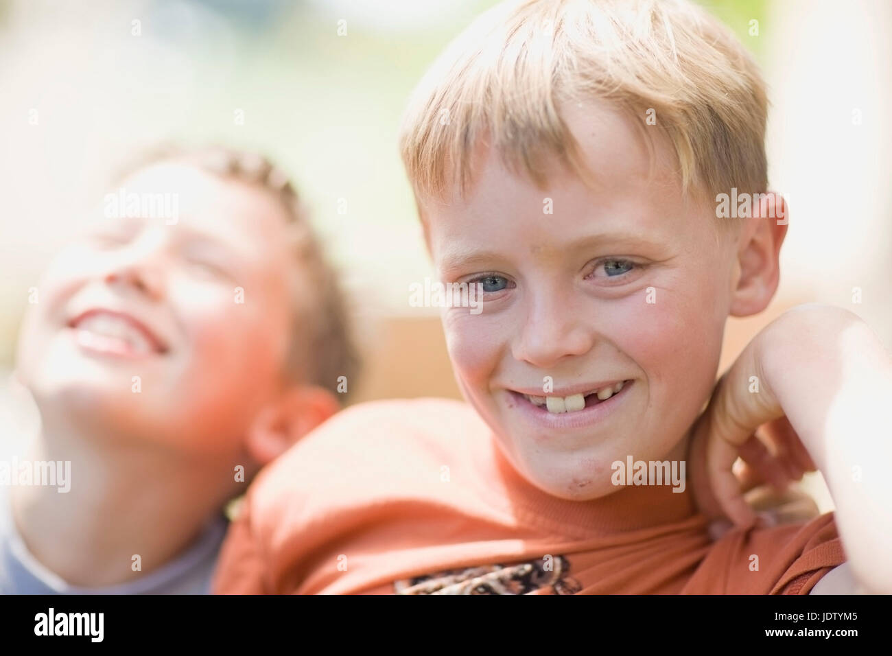 Boys sunbathing hi-res stock photography and images - Alamy