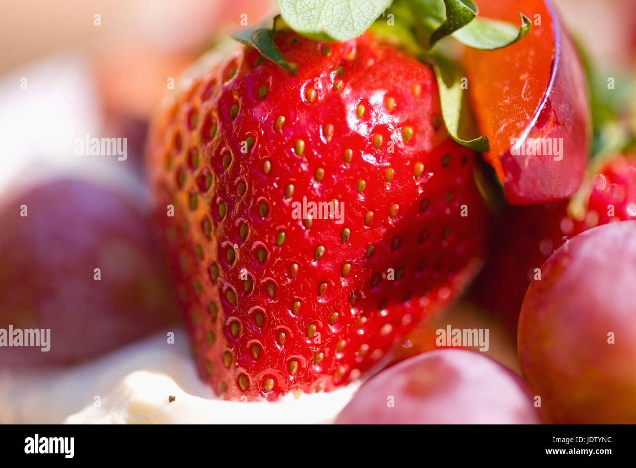 Close up of fruit and cream Stock Photo - Alamy