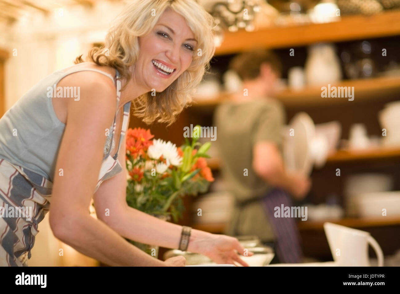 Carrying plates hi-res stock photography and images - Alamy