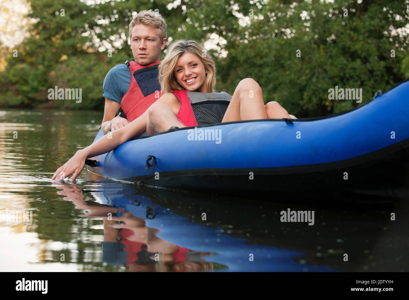 Smiling young man dipping hi-res stock photography and images - Alamy