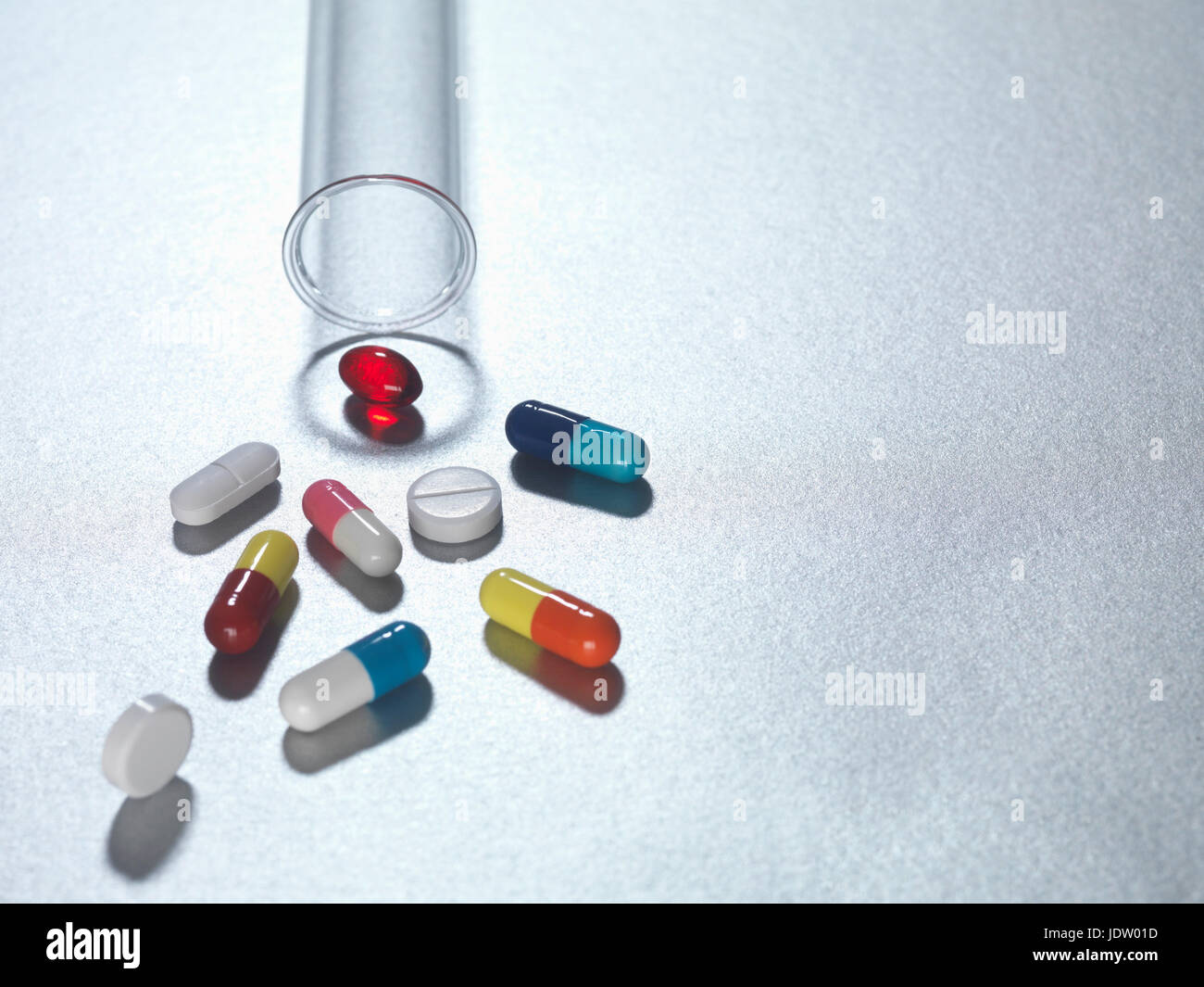 Medicine capsules in test tube Stock Photo - Alamy